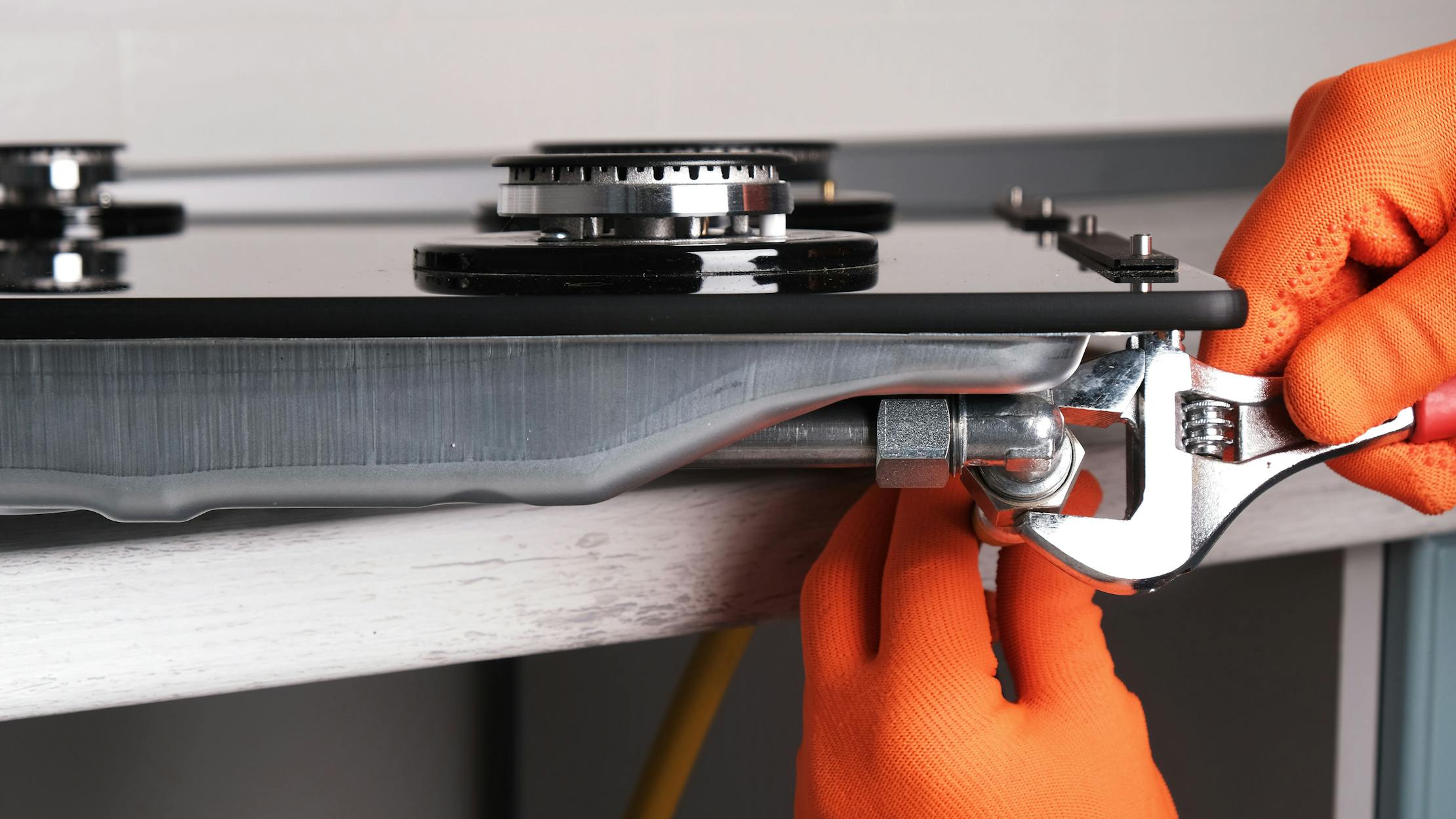 Who can install a gas hob?